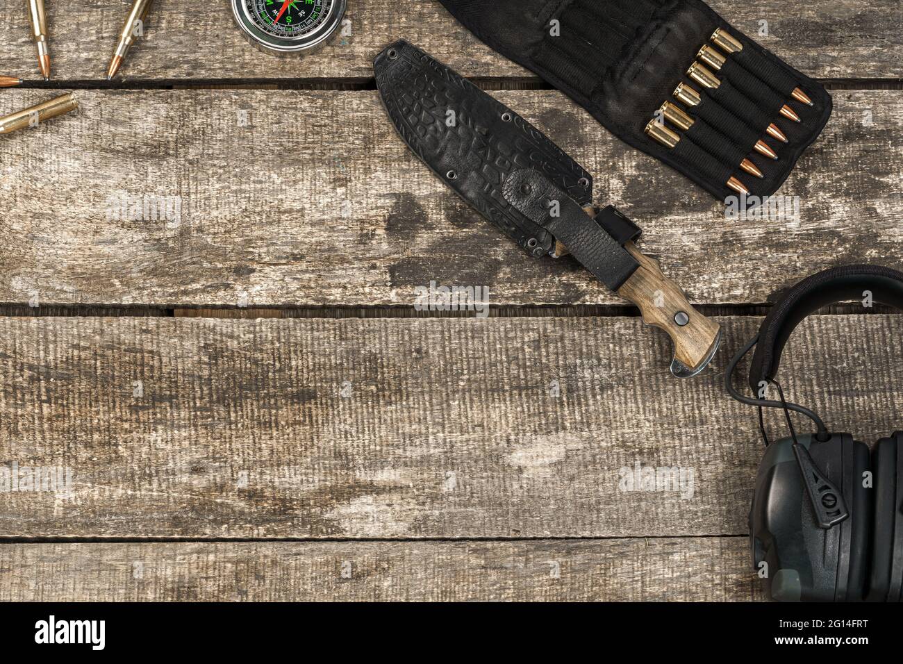 Hunting equipment on old dark wooden background Stock Photo - Alamy