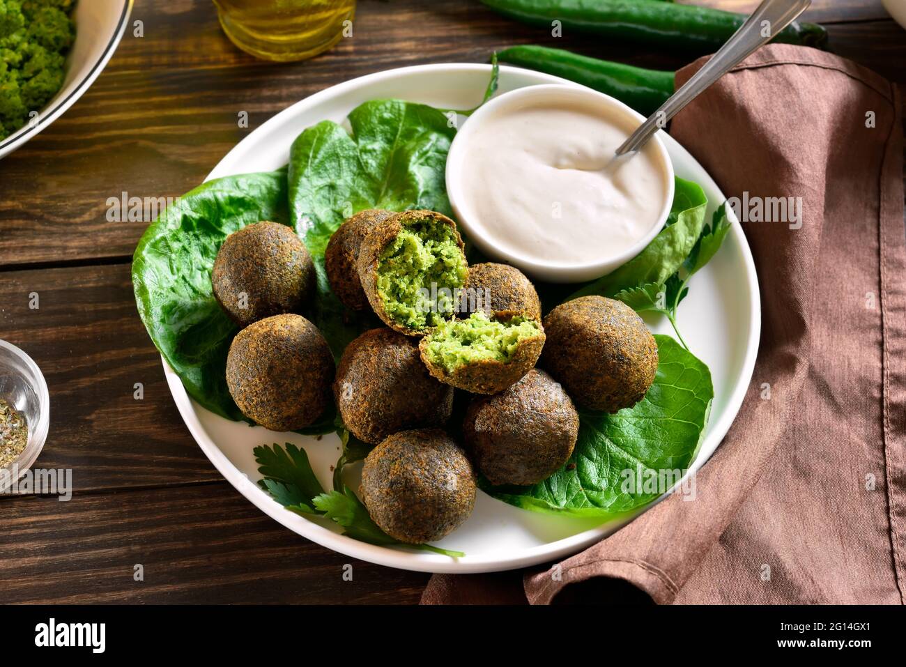 Falafel balls with sauce. Deep fried balls from ground chickpeas ...