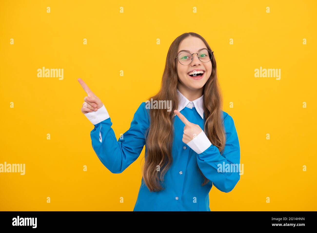 For best education of your child. Happy girl point fingers. School ...