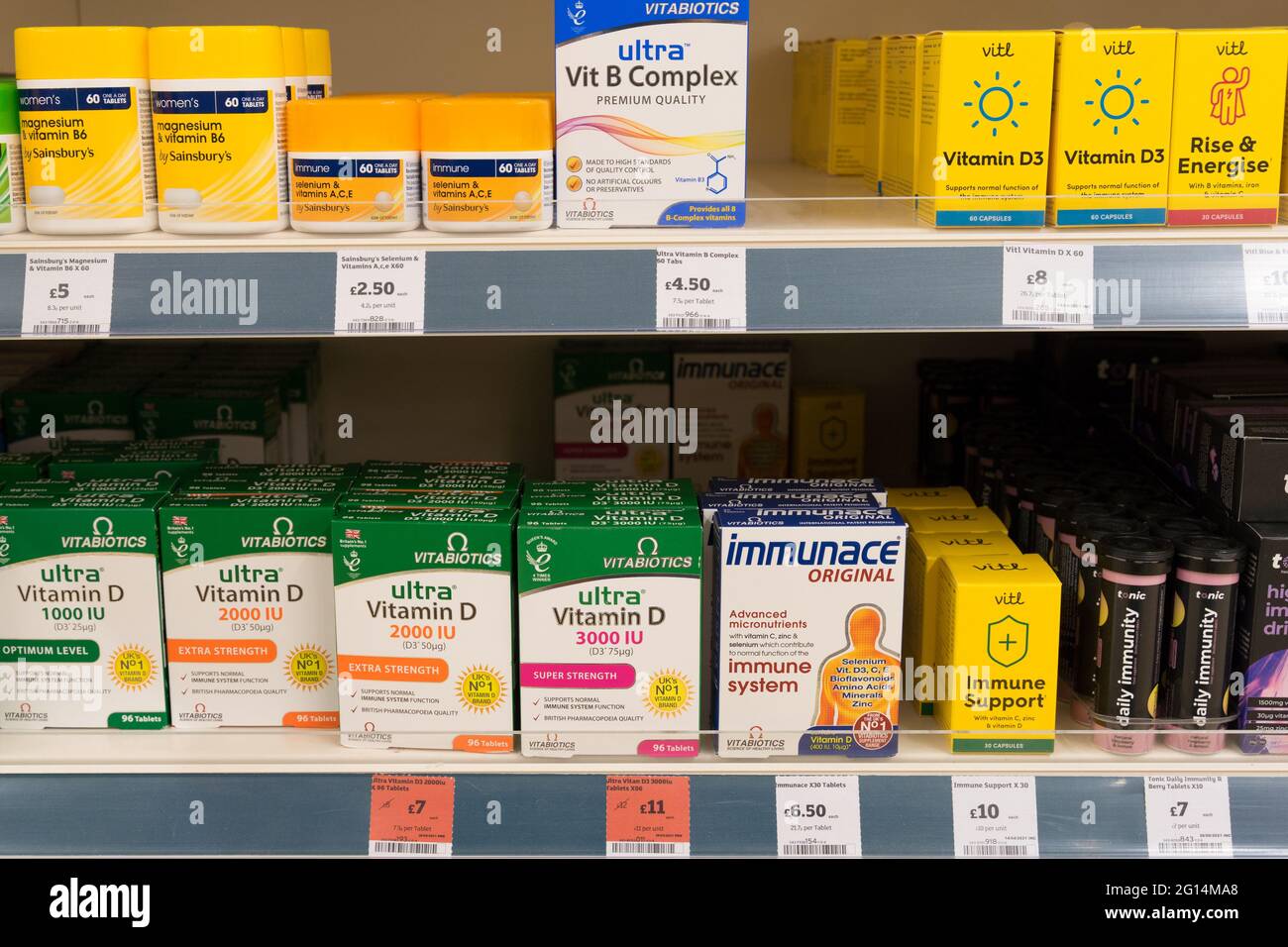 Boxes of Vitamins D, D3 on display on medicine shelves for sale at ...