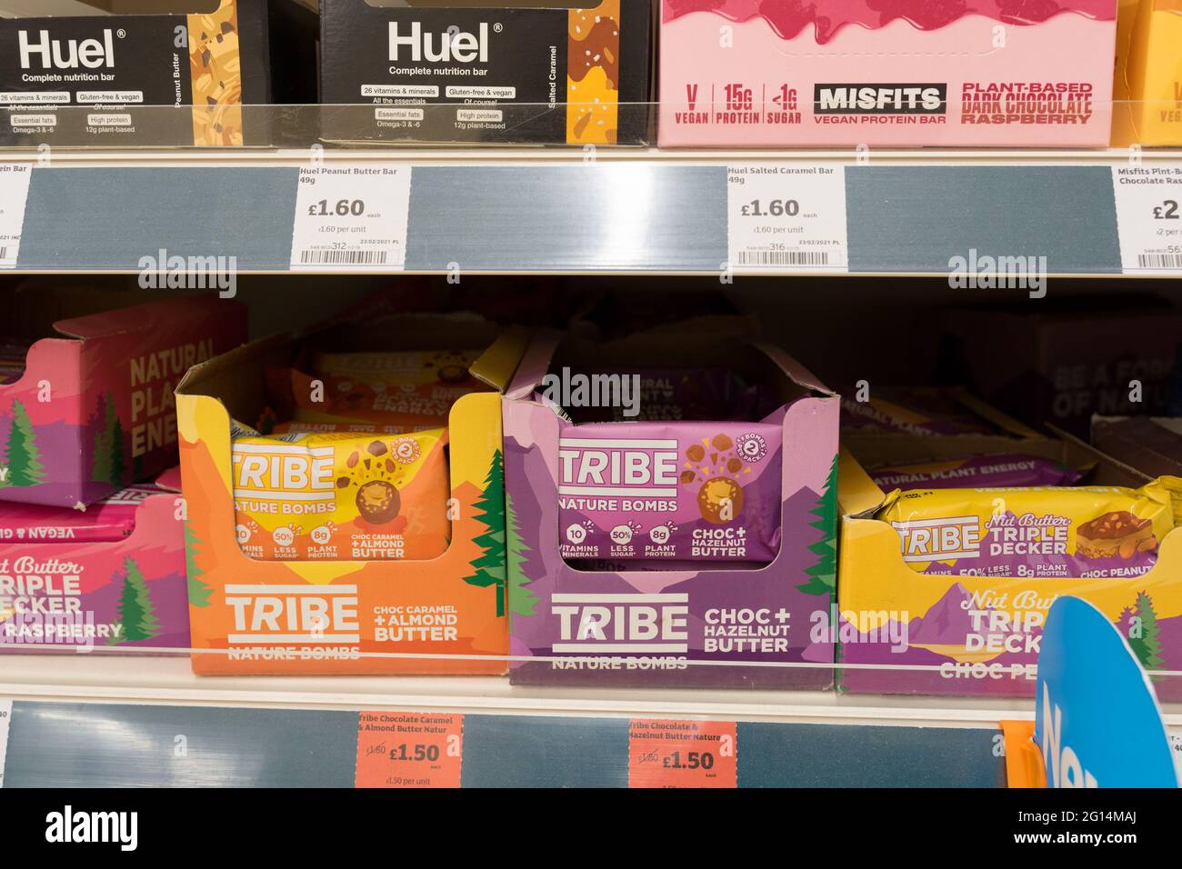 snack bars from Huel and TRIBE display on shelves for sale at ...