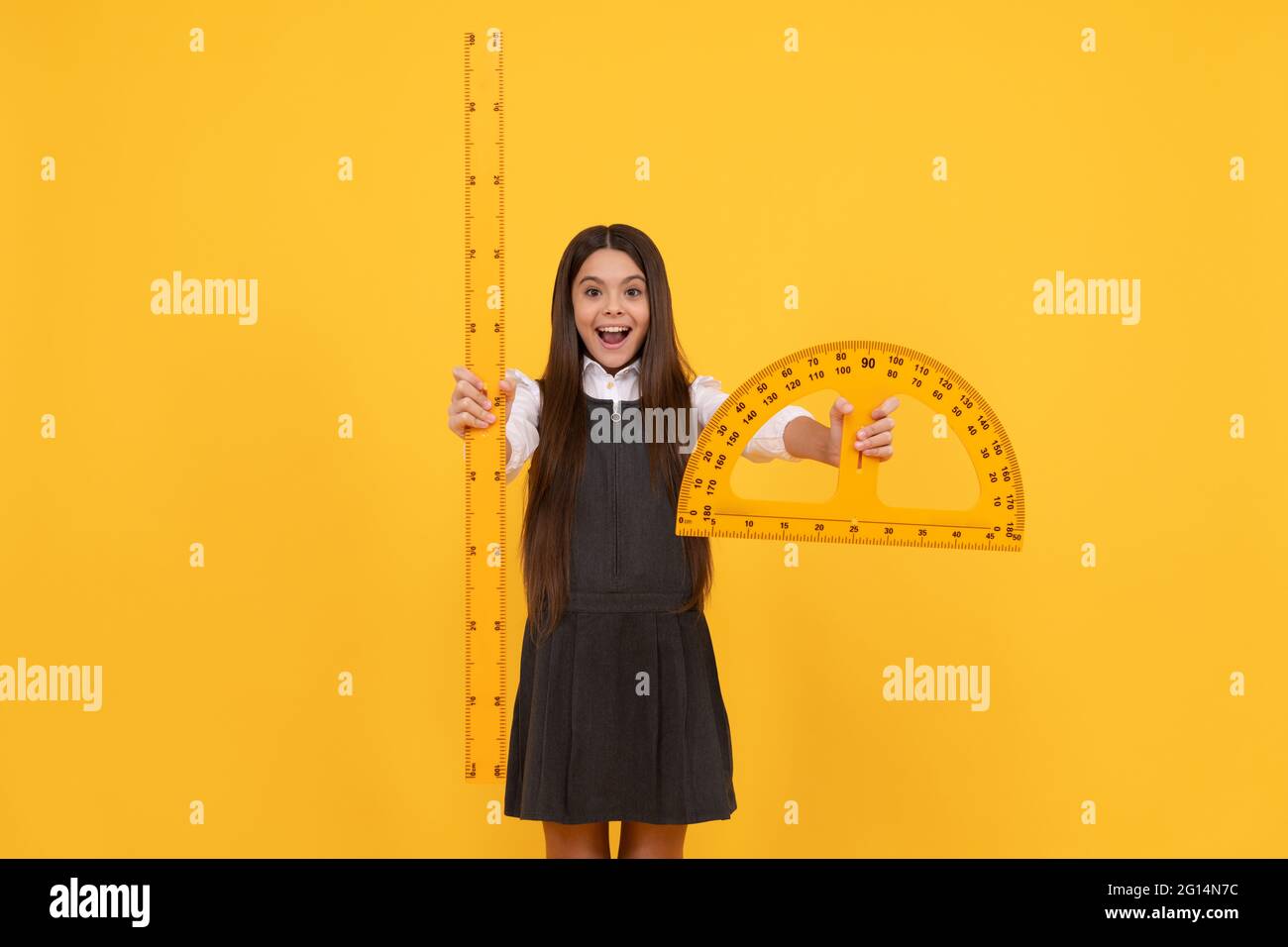 happy teen girl hold protractor ruler. back to school. algebra and ...