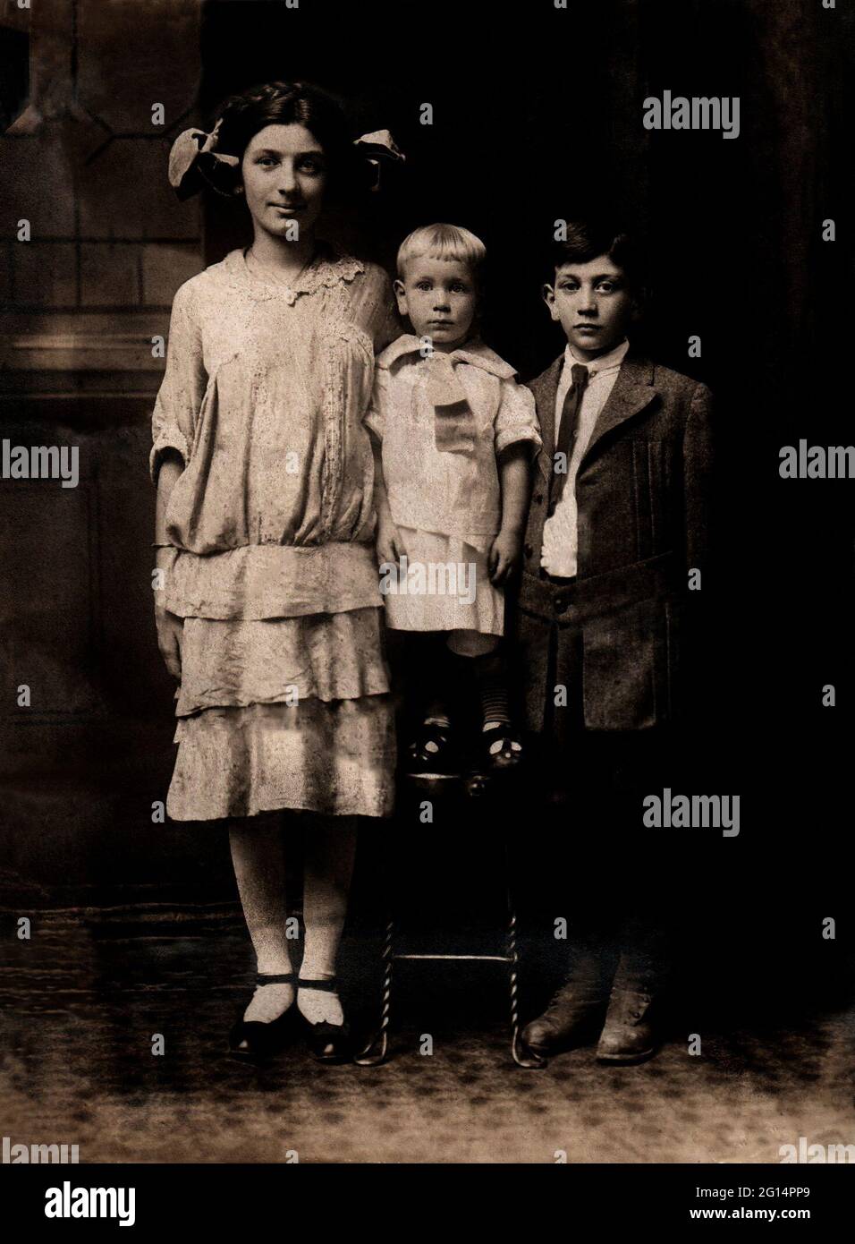 Vintage portrait of 3 siblings circa 1910: Older sister, brother and ...