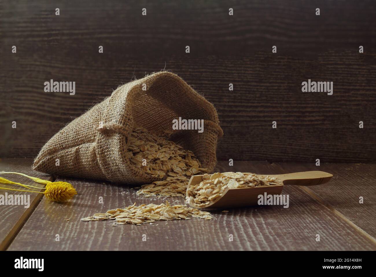Oatmeal flakes in burlap sack hi-res stock photography and images - Alamy