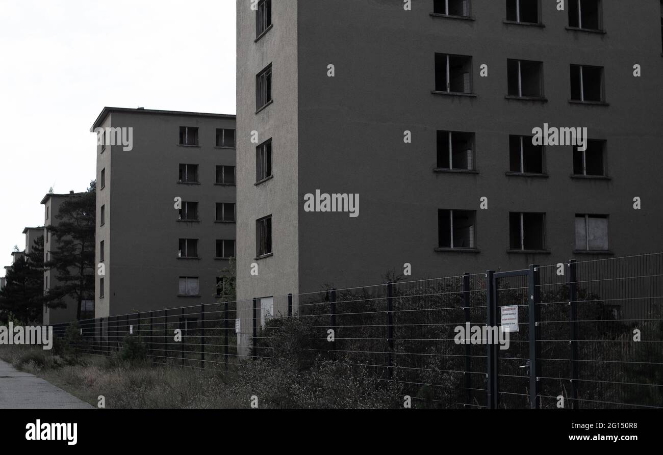 Vertical of a row of the abandoned and weathered tall buildings Stock ...