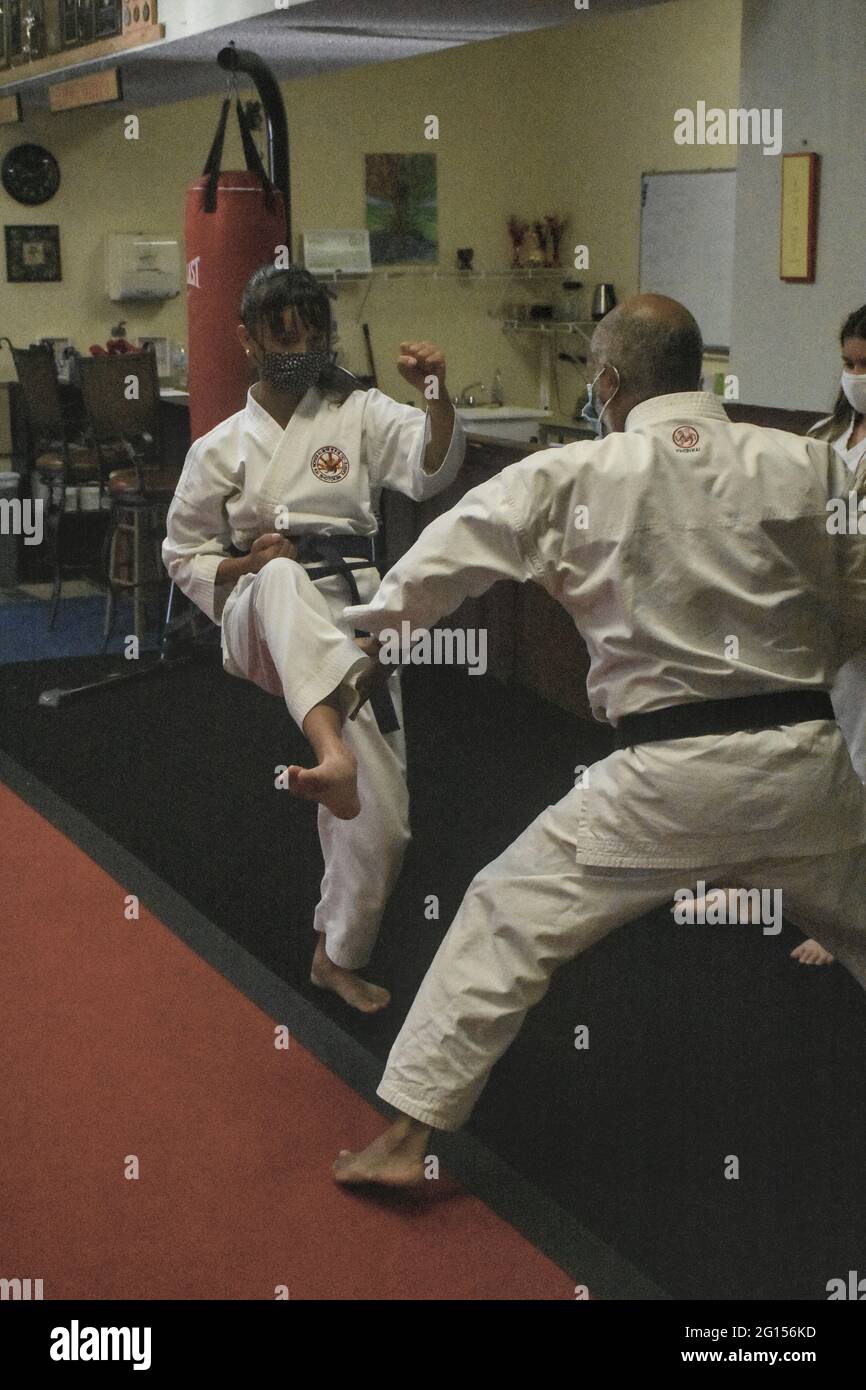 This action photo is of my daughter and her classmates in a Karate ...