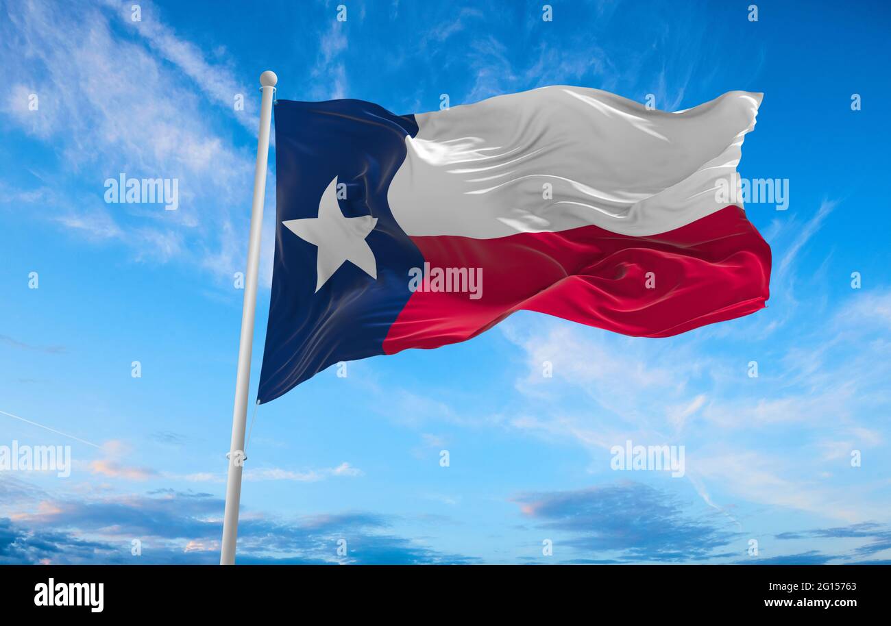 flag of Texas at cloudy sky background on sunset. Patriotic concept ...