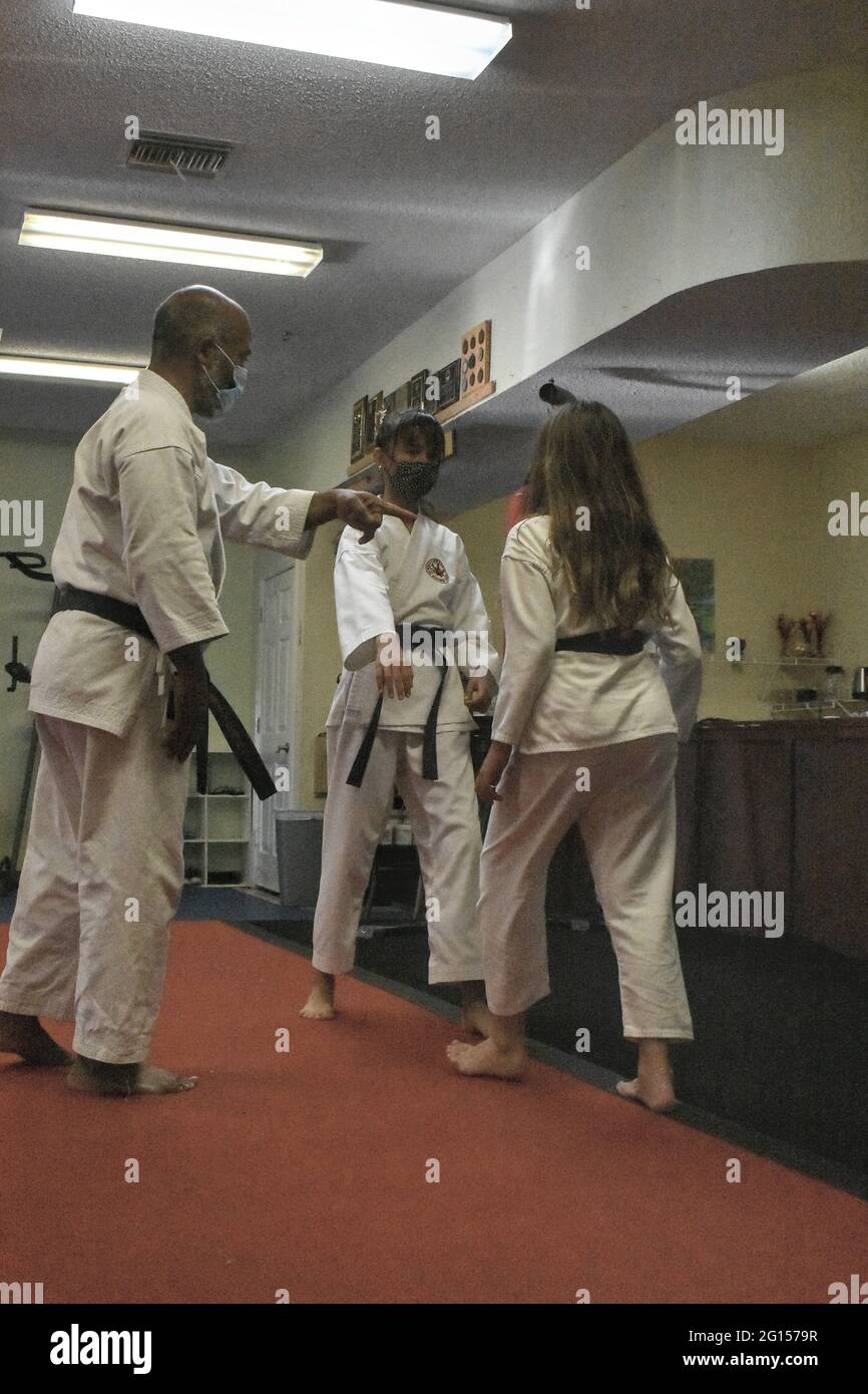 This action photo is of my daughter and her classmates in a Karate ...