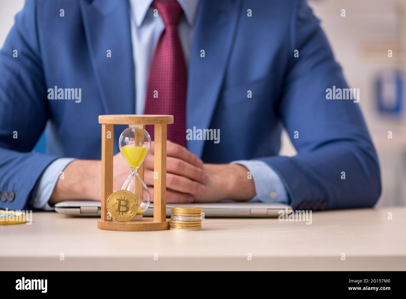 Man earning money via Internet in time management concept Stock Photo ...