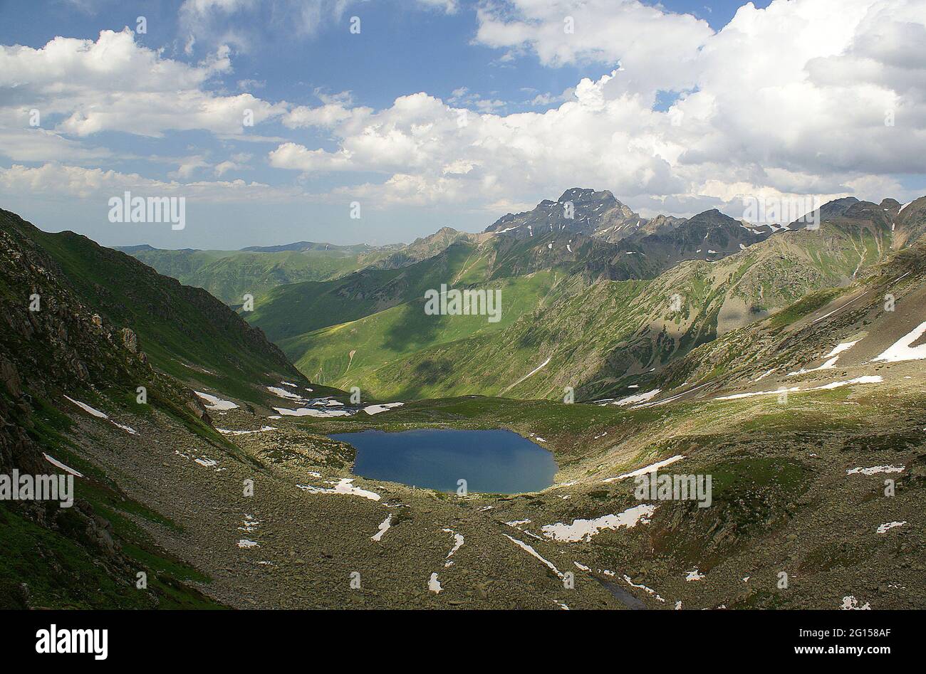 This unique mountain view and pond view, taken from a high hill by ...