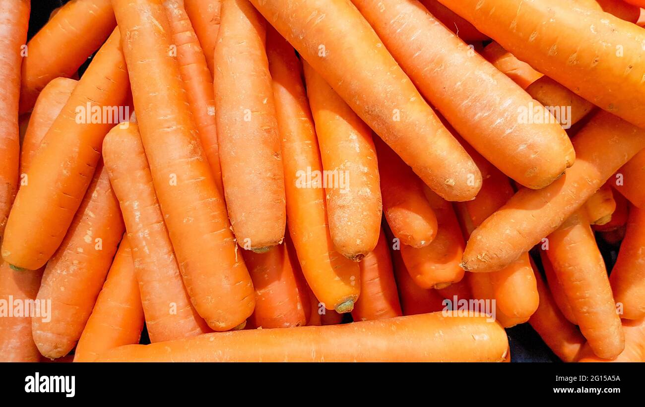 Carrots placed in a stall for sale.Macro Photo spring food vegetable ...