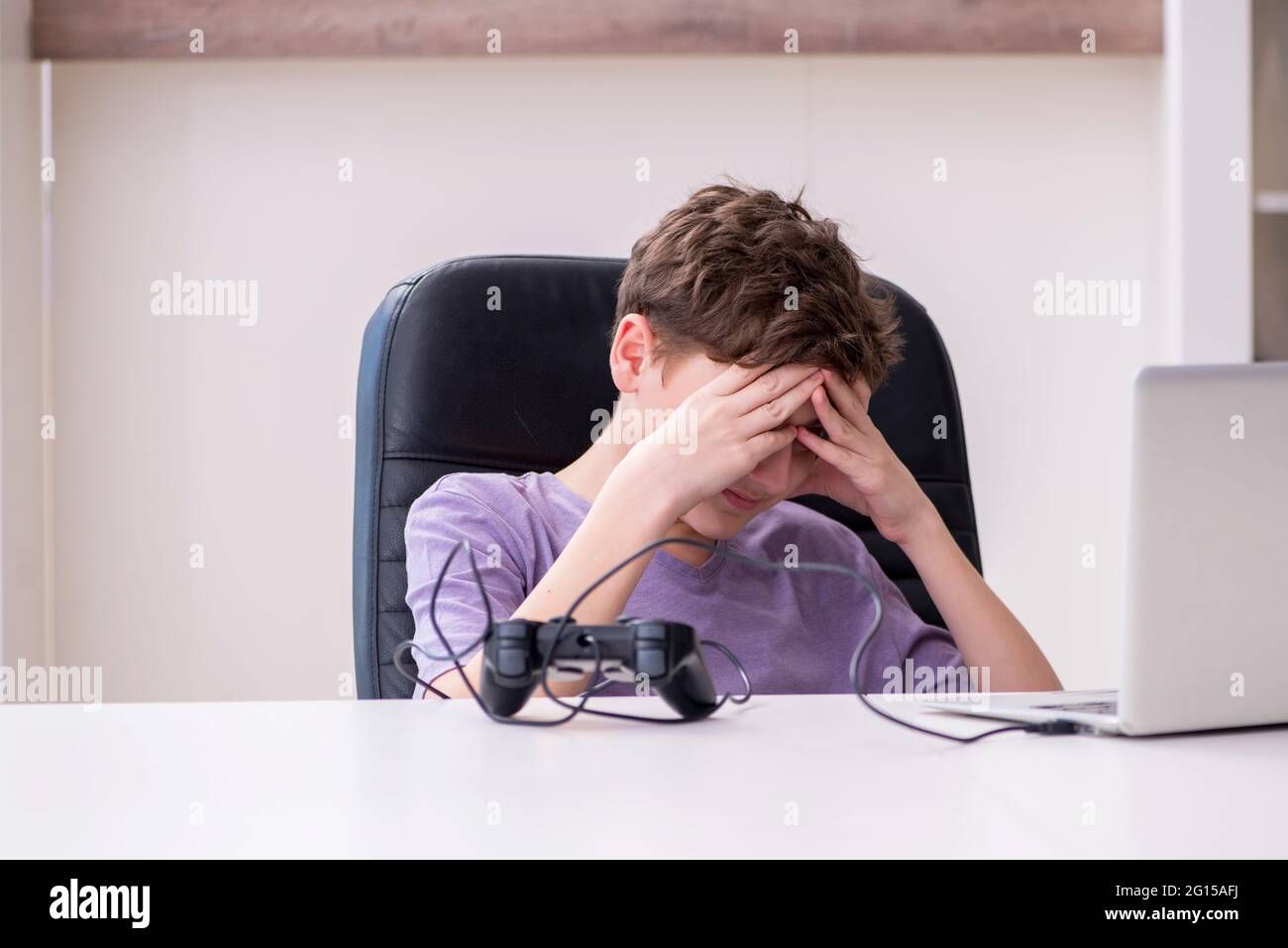 Boy playing computer games at home Stock Photo - Alamy