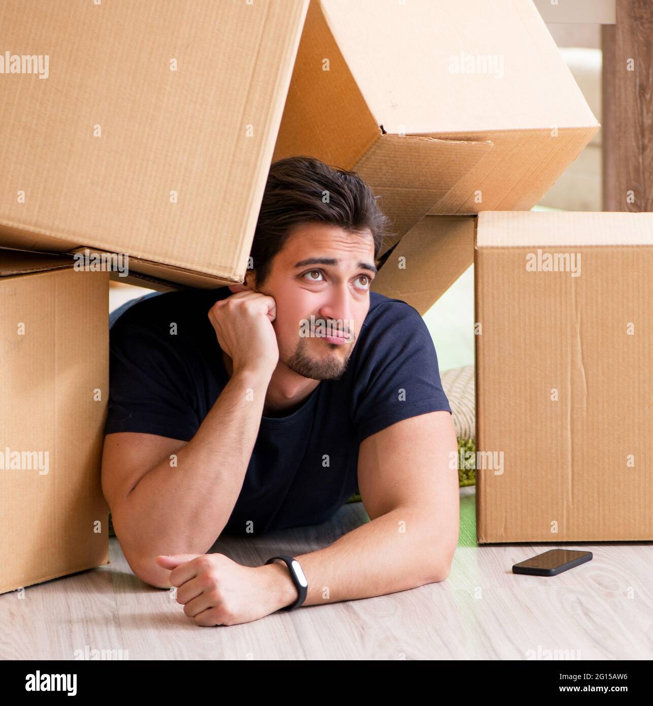 The man moving house with boxes Stock Photo - Alamy