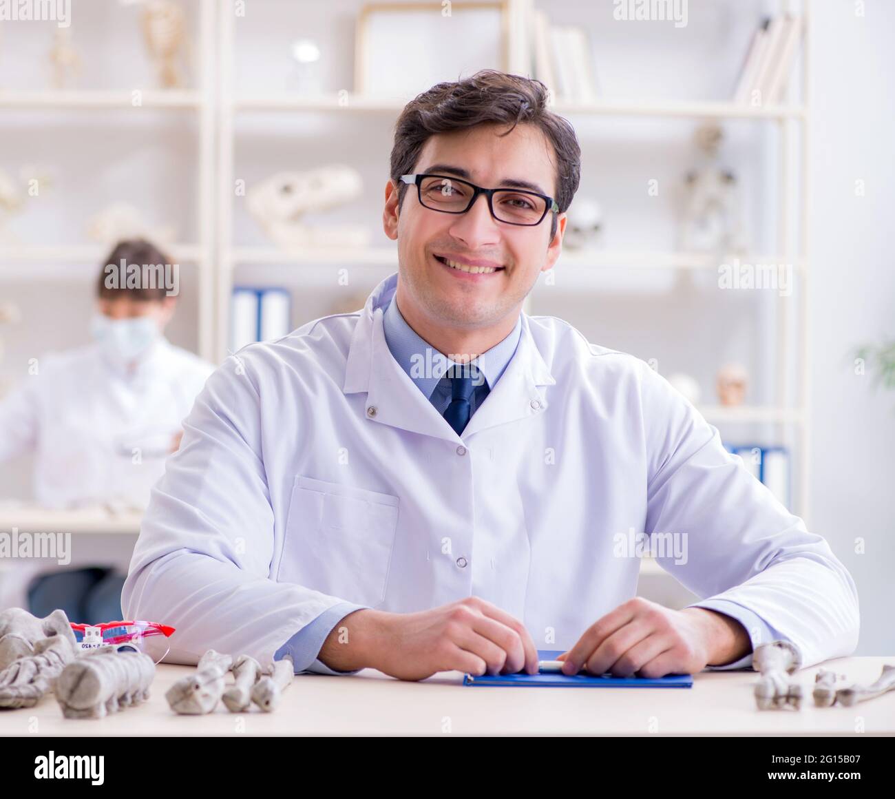 The professor studying human skeleton in lab Stock Photo - Alamy