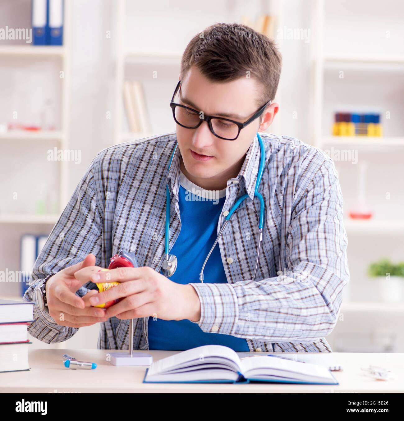 The medical student studying heart in classroom during lecture Stock ...