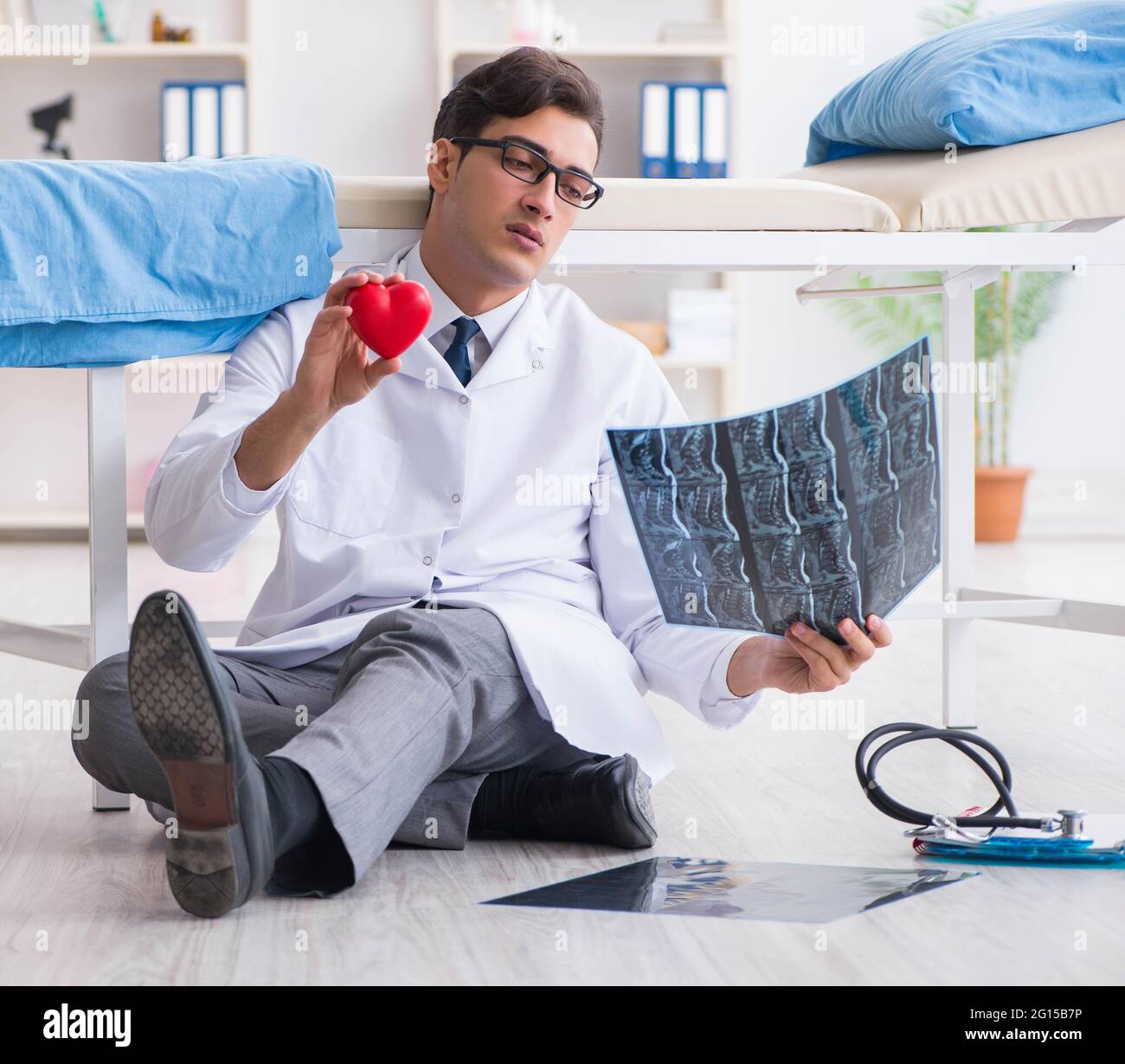 The cardiologist frustrated after unsuccessful surgery Stock Photo - Alamy
