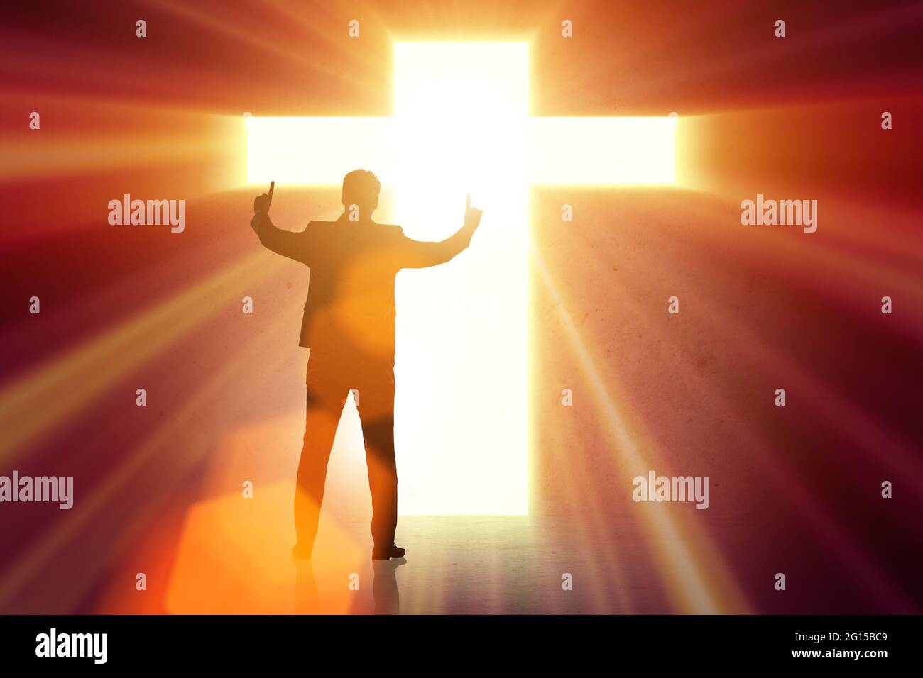 Religious concept with the cross and lonely man Stock Photo - Alamy