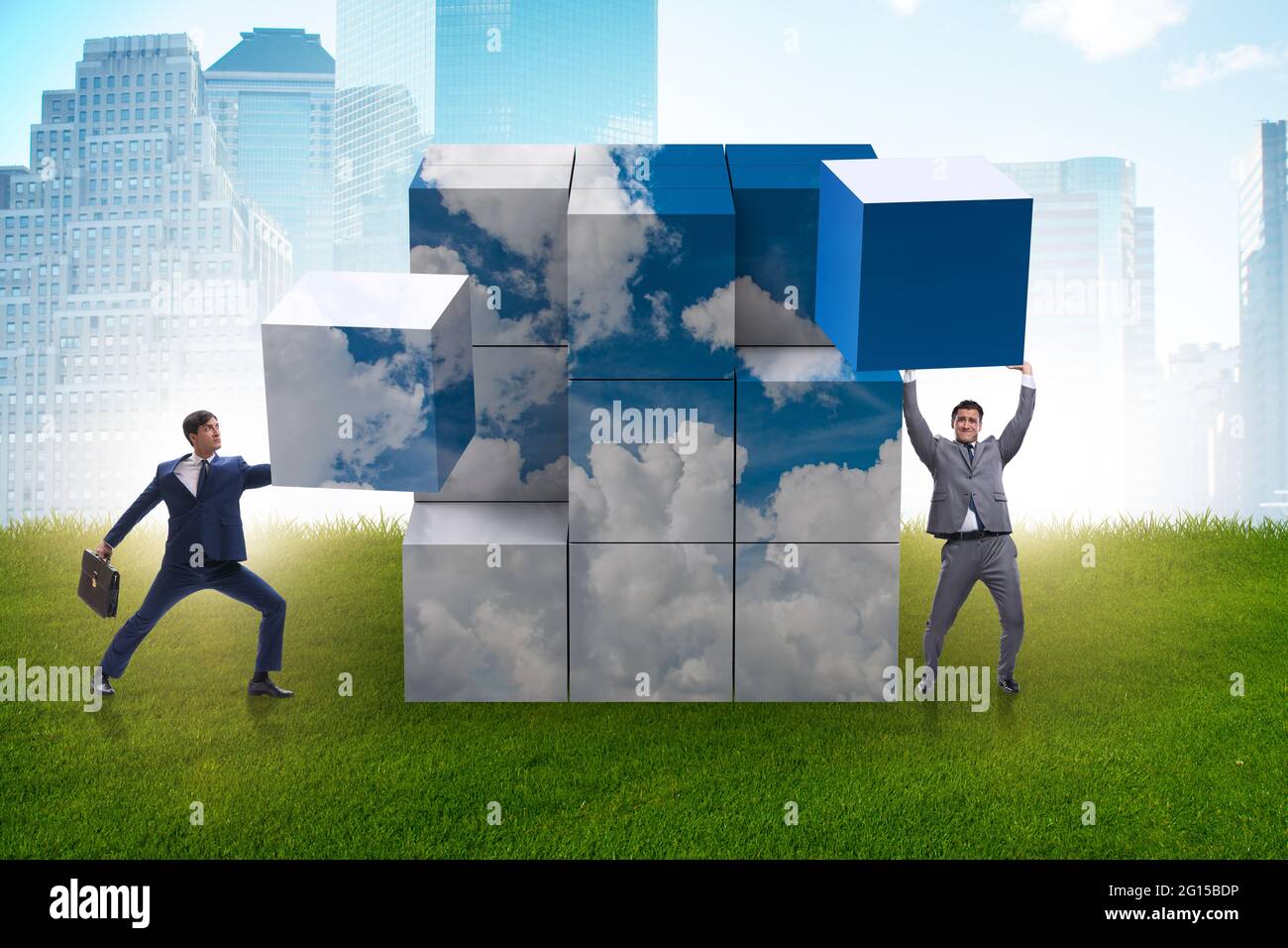 Businessman building cloud cube with the shapes Stock Photo - Alamy