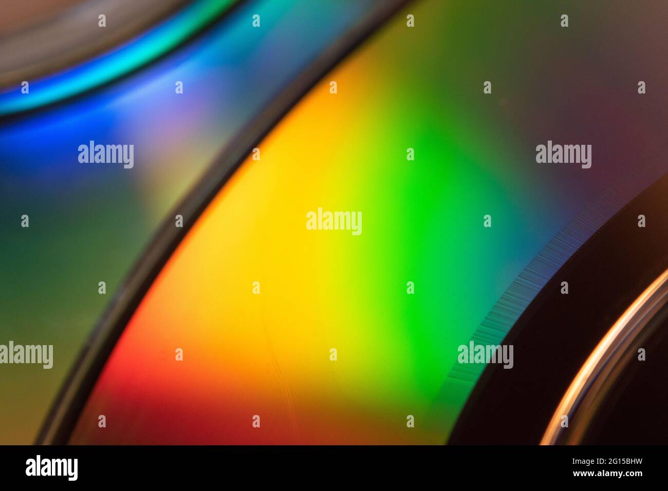 Abstract photo of the reflection of the bottom of a CD displaying a ...