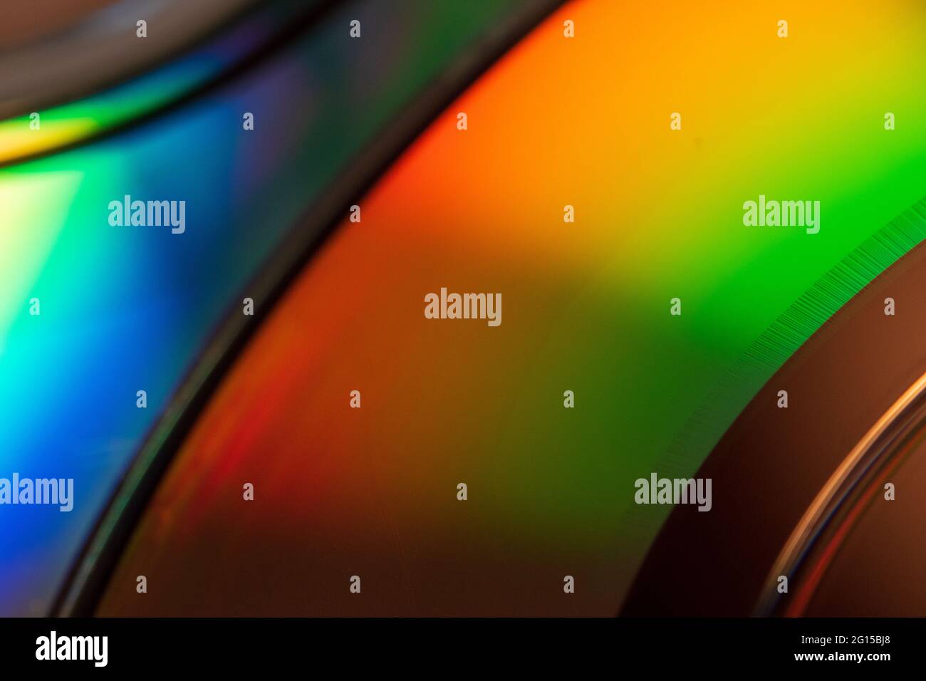 Abstract photo of the reflection of the bottom of a CD displaying a ...