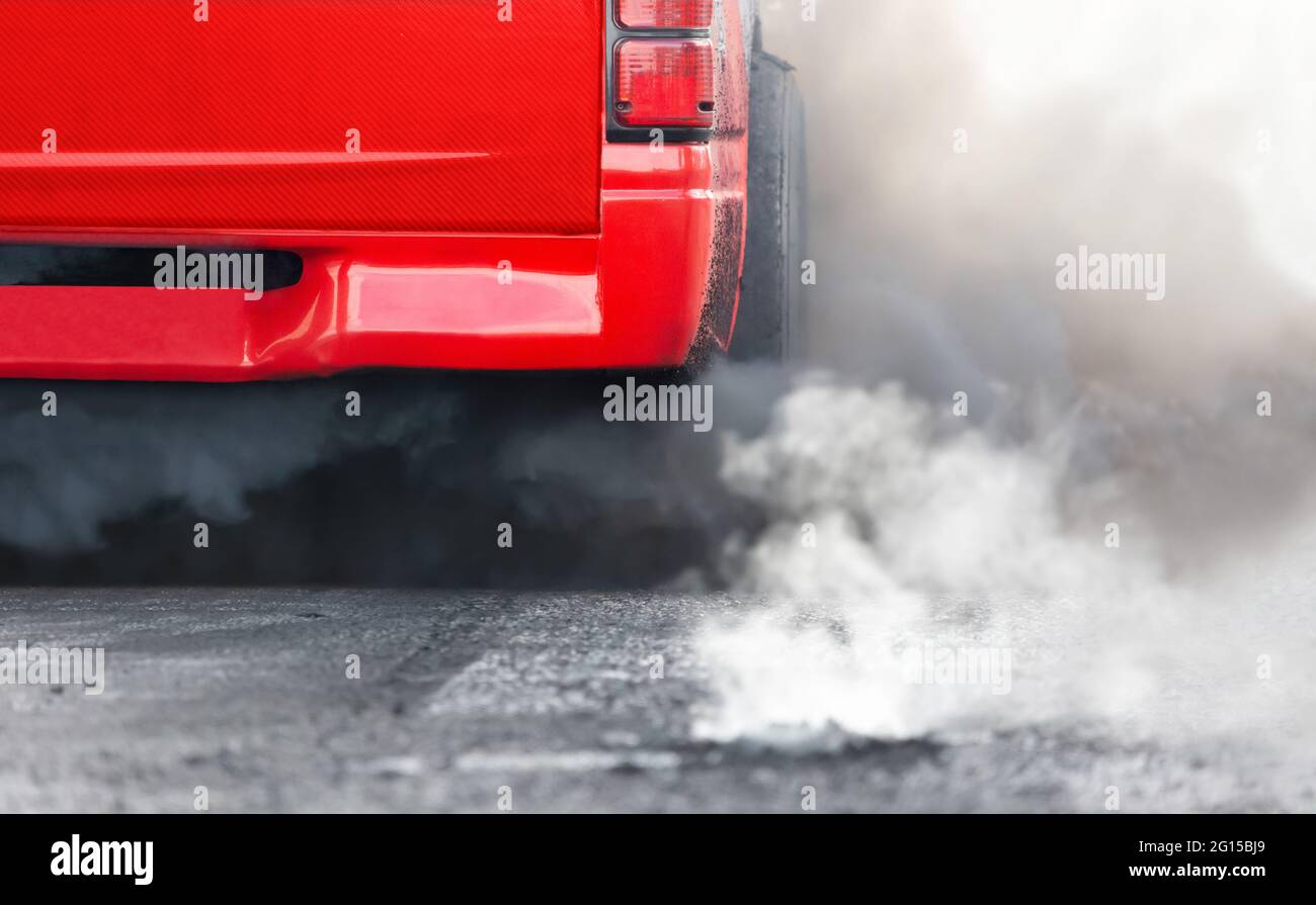 air pollution crisis in city from diesel vehicle exhaust pipe on road ...