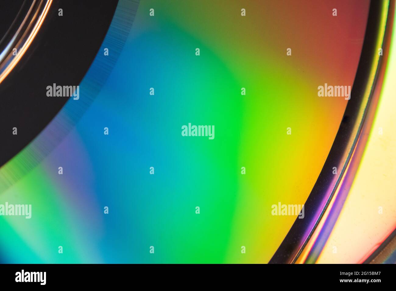 Abstract photo of the reflection of the bottom of a CD displaying a ...