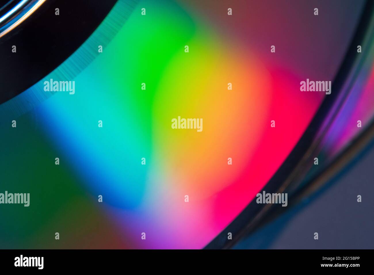 Abstract photo of the reflection of the bottom of a CD displaying a ...