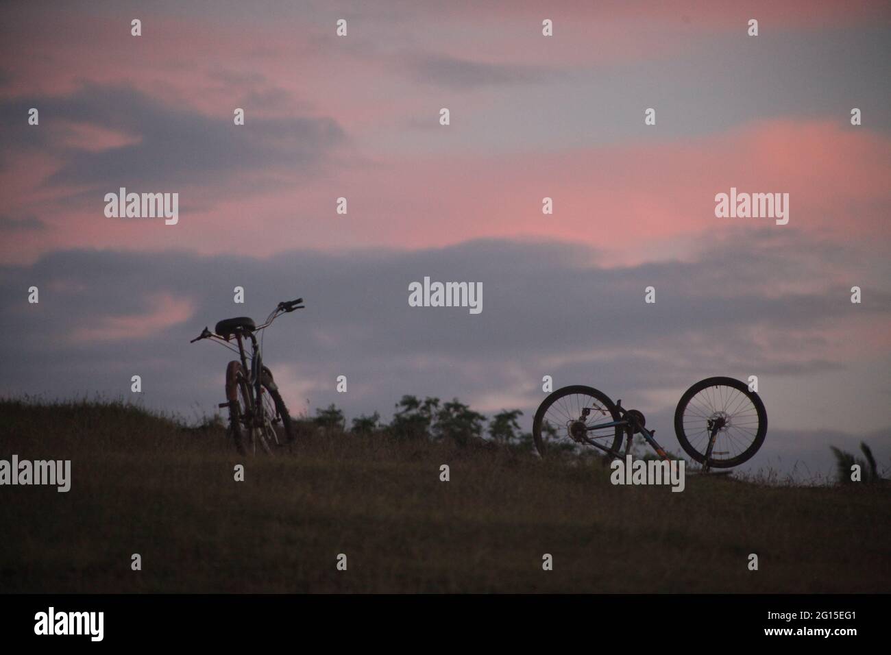 Two bikes at sunset, Easter Island, Chile Stock Photo - Alamy
