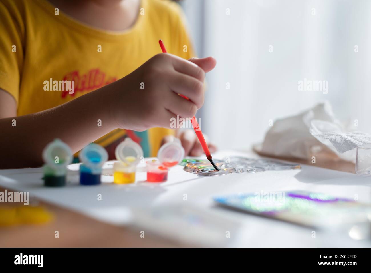 child paint color on paper, education concept Stock Photo - Alamy