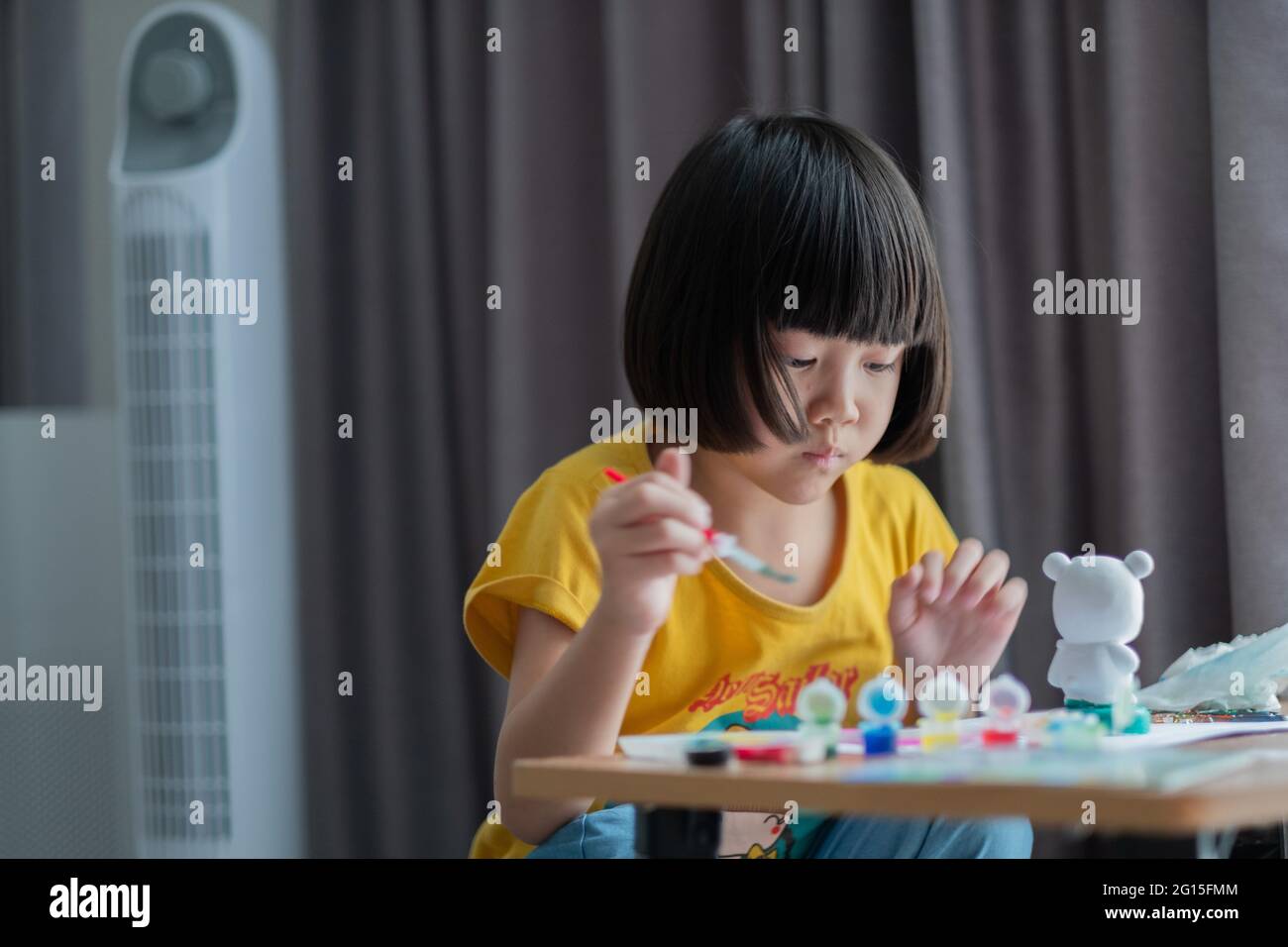 asian kid paint color on paper, education concept Stock Photo - Alamy
