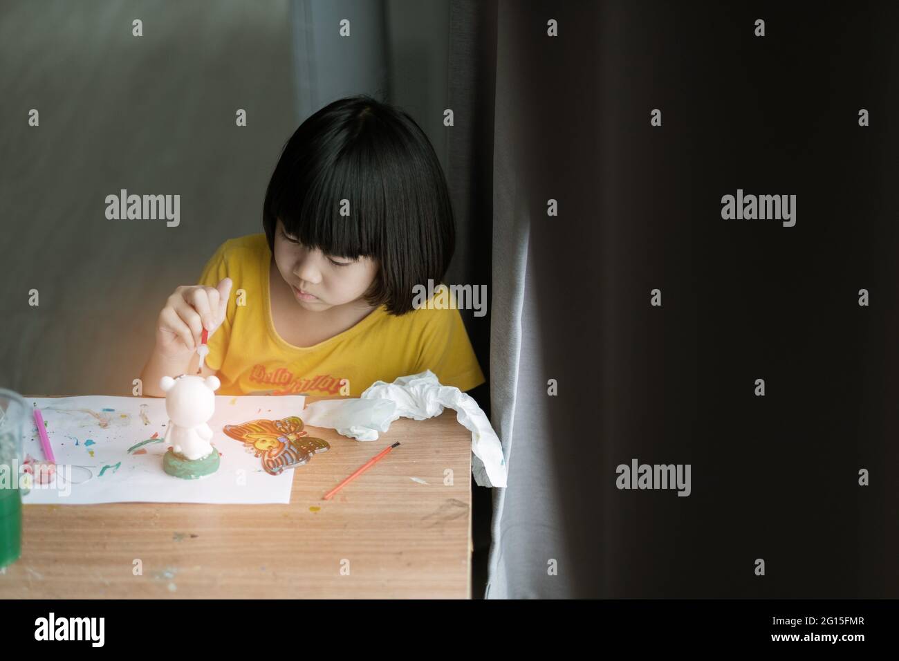 asian kid paint color on paper, education concept Stock Photo - Alamy
