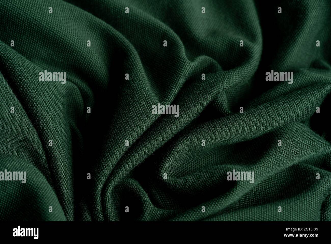 green fabric texture background Stock Photo - Alamy