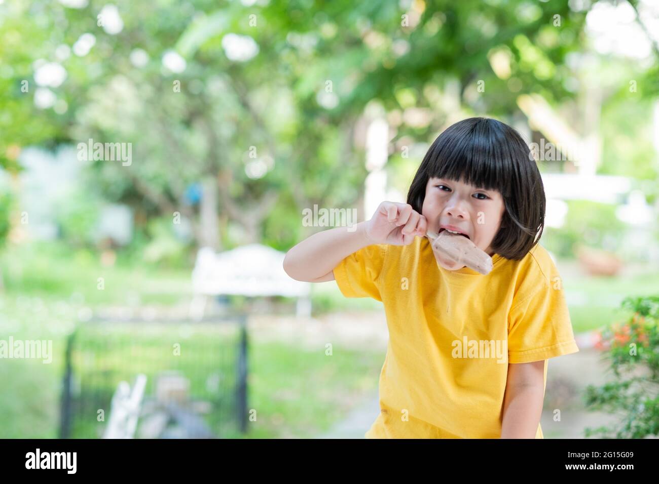 kid eating ice cream, delicious and happy concept Stock Photo - Alamy
