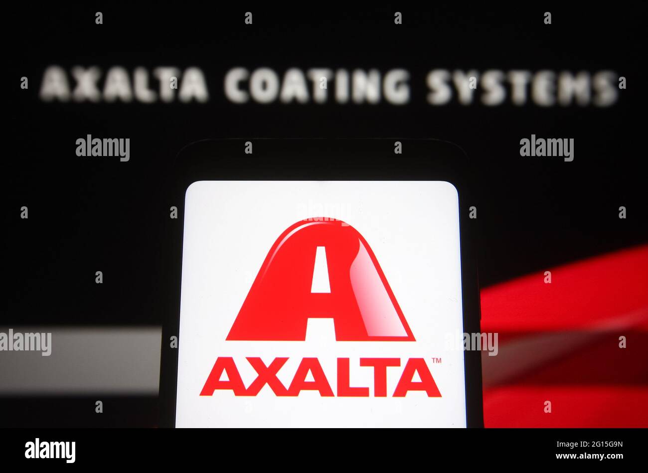 In this photo illustration, Axalta Coating Systems logo is seen on a ...