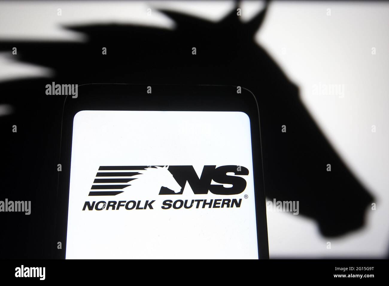 In this photo illustration, Norfolk Southern logo is seen on a ...
