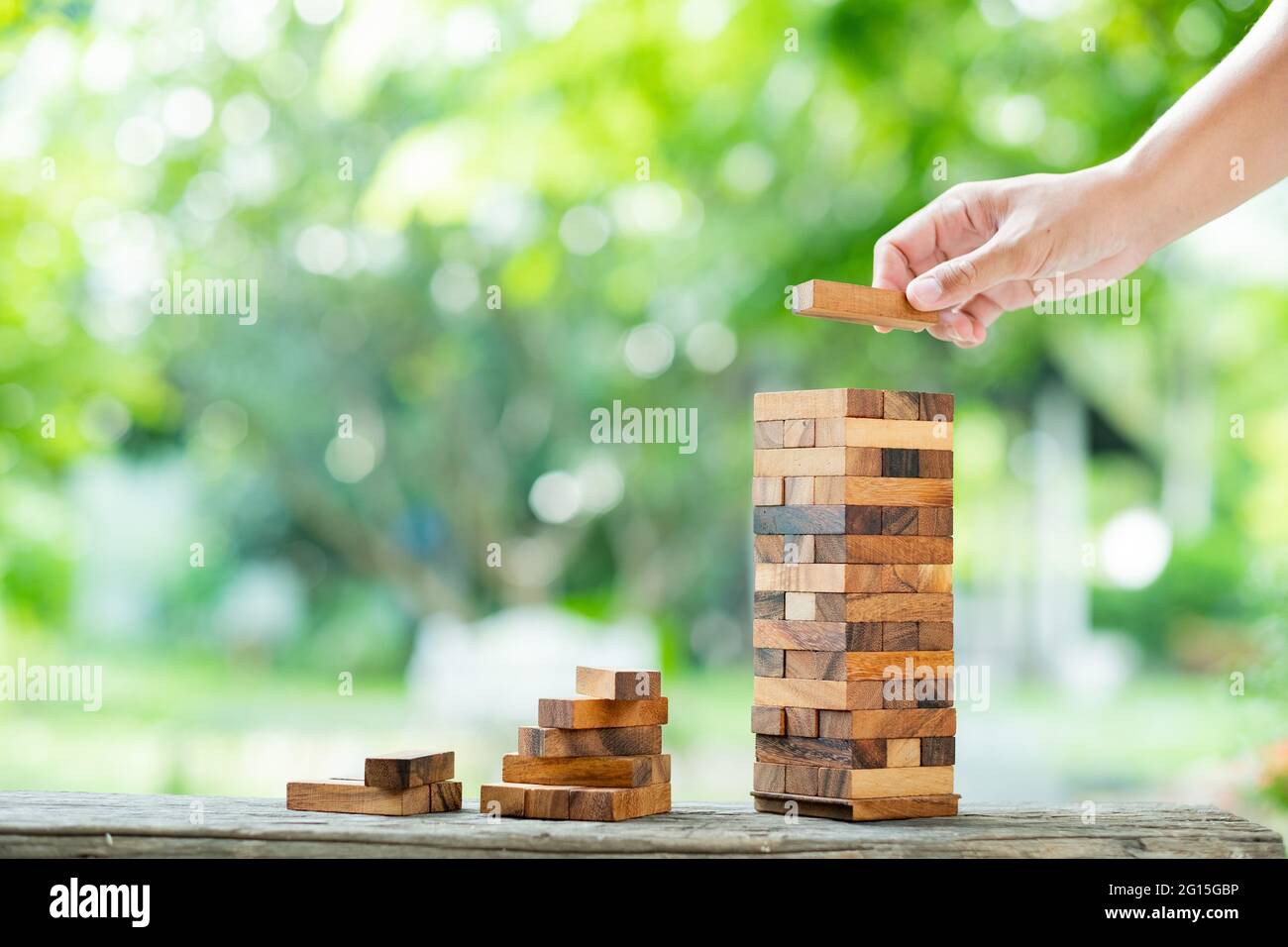 building wood blocks, plan and strategy Stock Photo - Alamy
