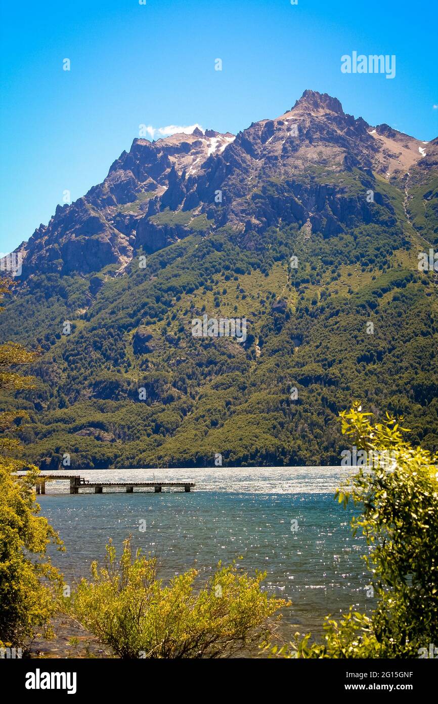 deck port at lake with mountain, in Patagonia Argentina Stock Photo - Alamy