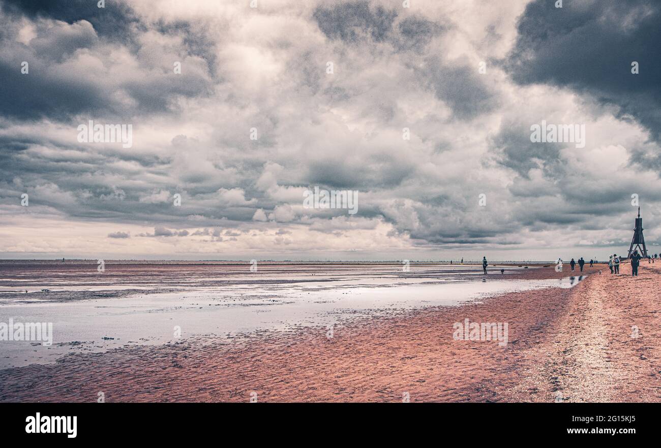 Cuxhaven on the German North Sea coast. The Kugelbake, a wooden beacon ...
