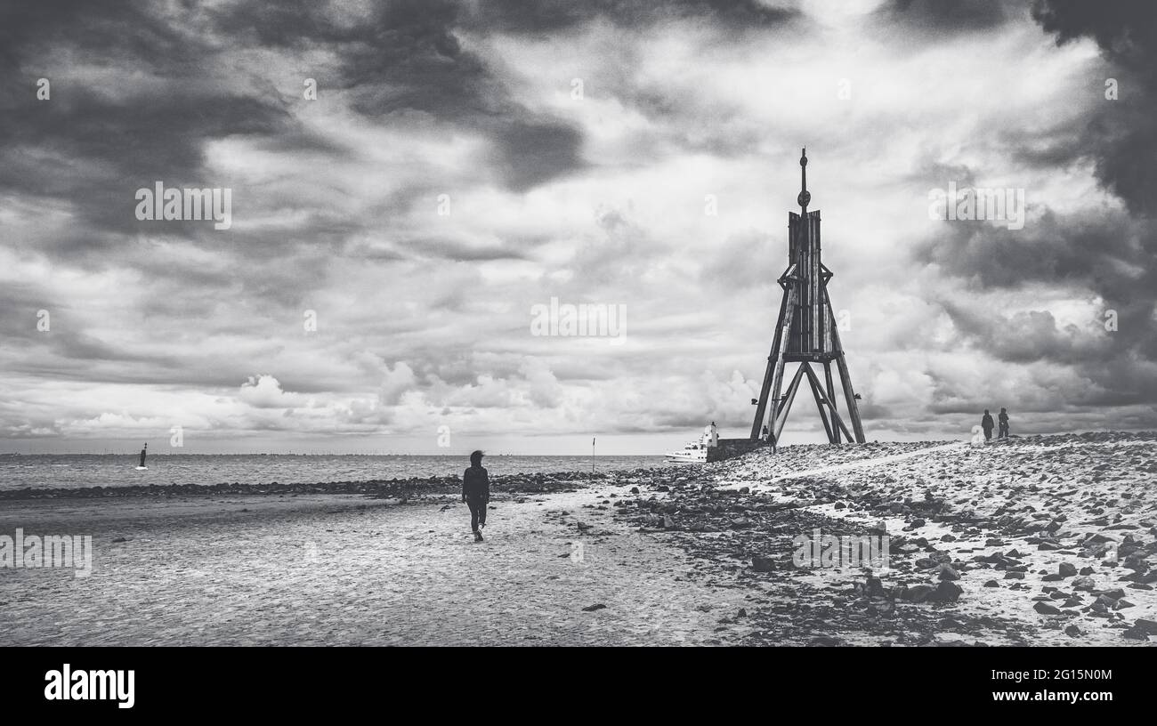 Cuxhaven on the German North Sea coast. The Kugelbake, a wooden beacon ...