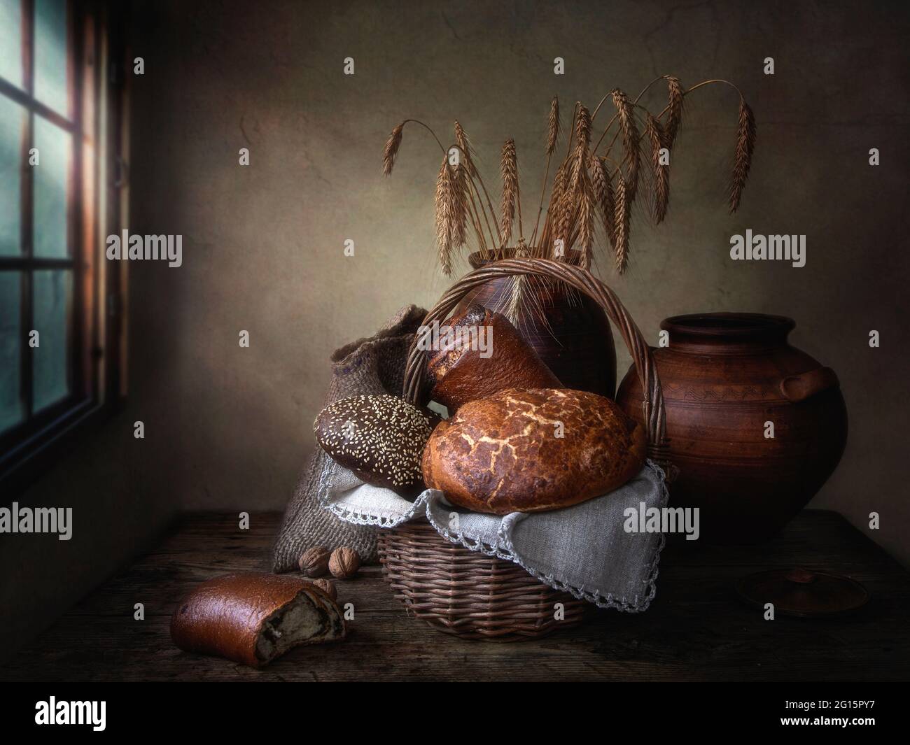 Rustic still life with bread and pastries Stock Photo - Alamy