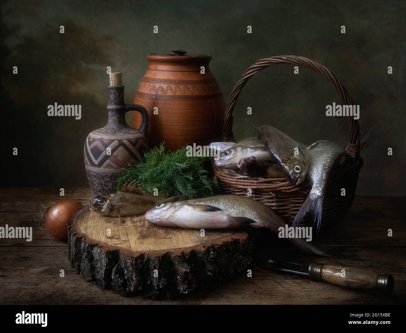 Still life with fish on a kitchen table Stock Photo - Alamy
