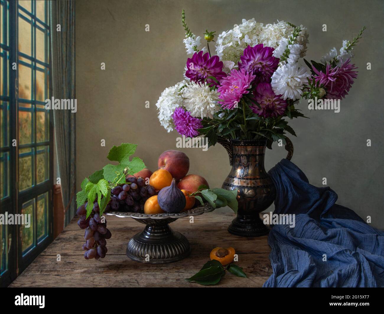 Still life with beautiful bouquet of flowers and fruits Stock Photo - Alamy