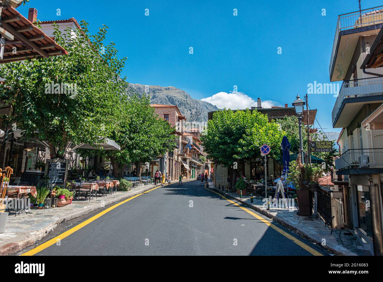 Cobbled alley and stone houses in the mountain town of Arachova at the ...