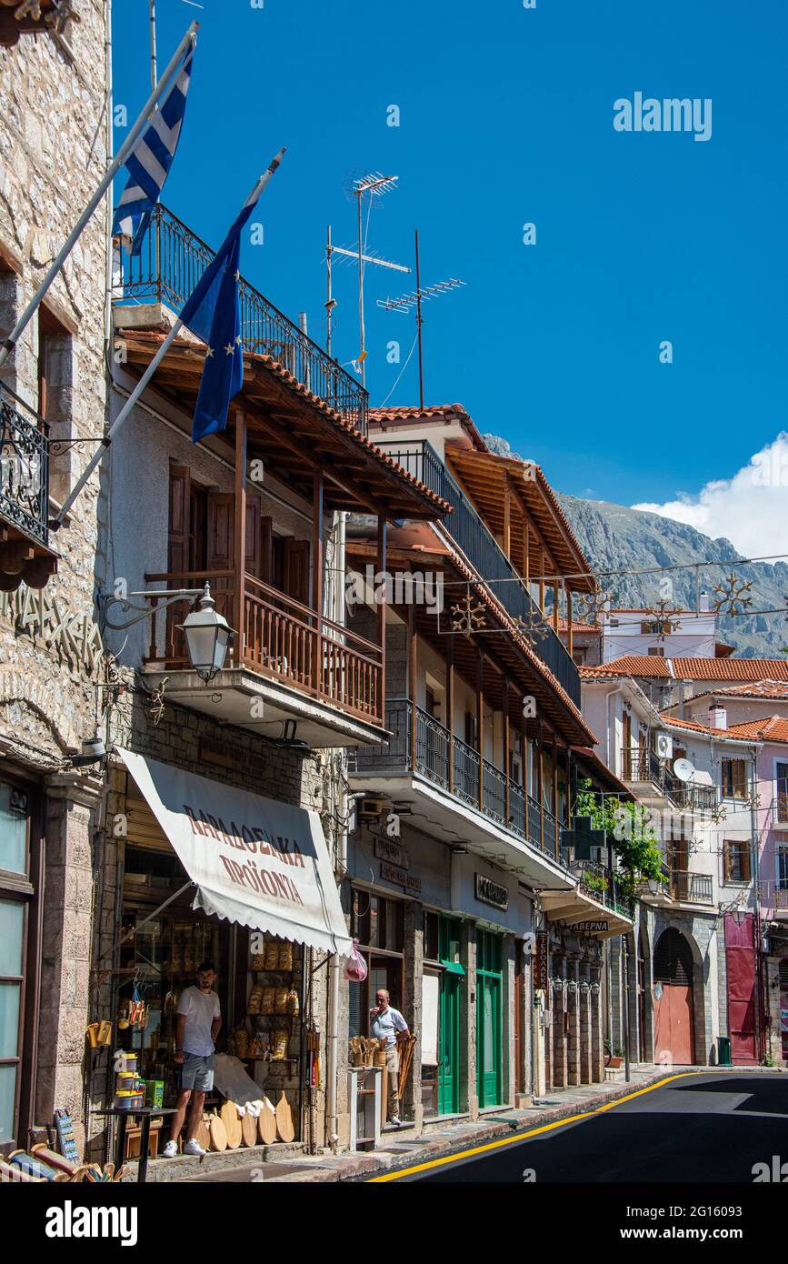Cobbled alley and stone houses in the mountain town of Arachova at the ...