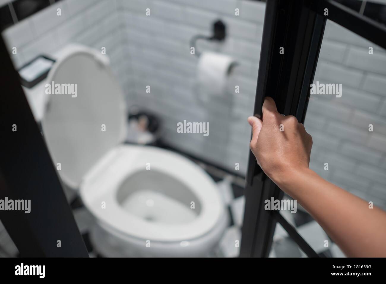 open the bathroom door, go to toilet Stock Photo - Alamy