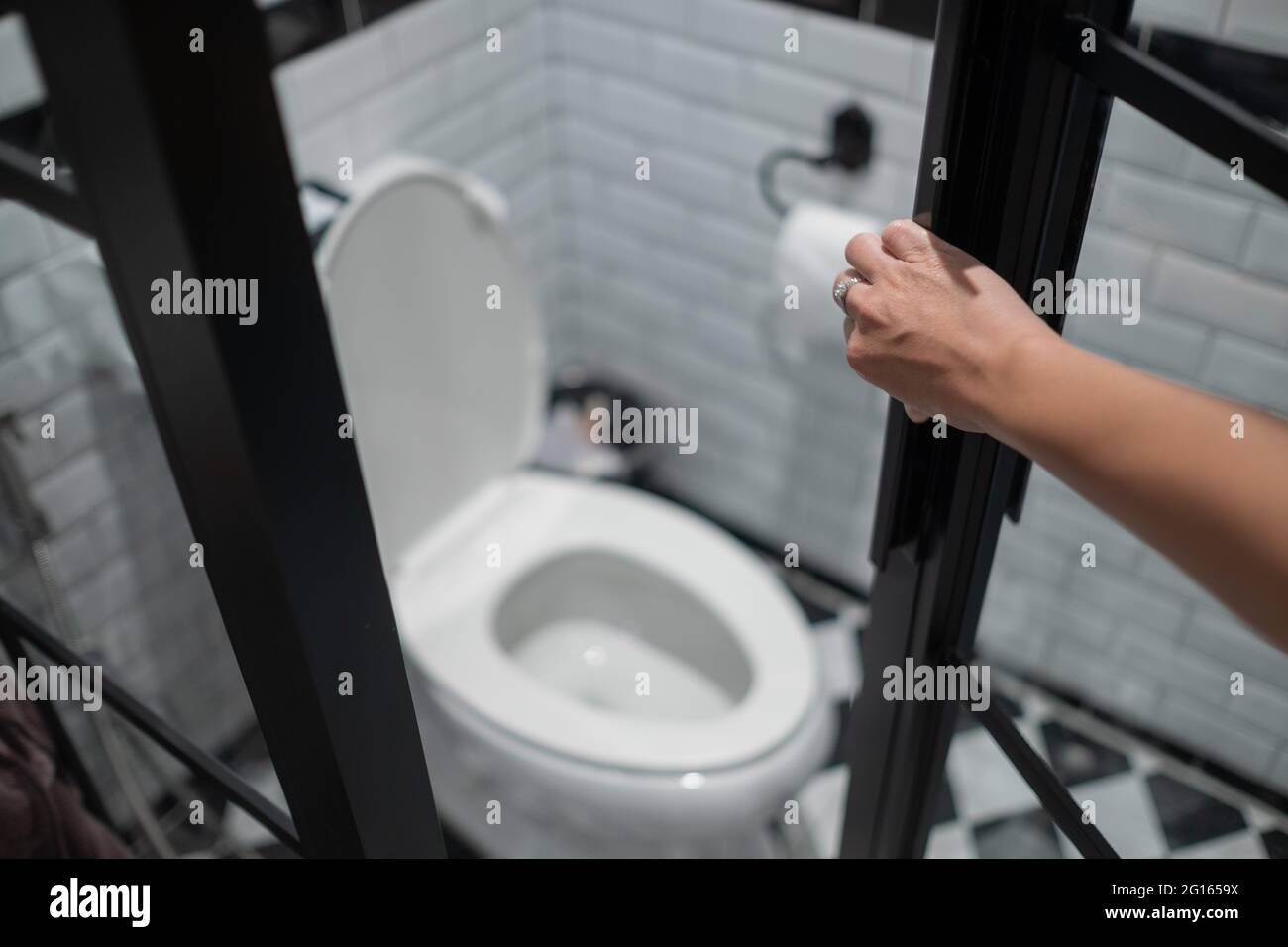 open the bathroom door, go to toilet Stock Photo - Alamy