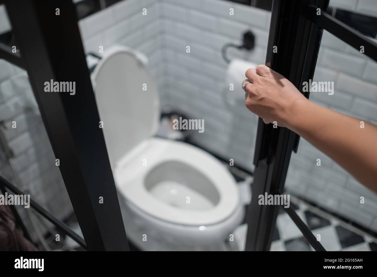open the bathroom door, go to toilet Stock Photo - Alamy