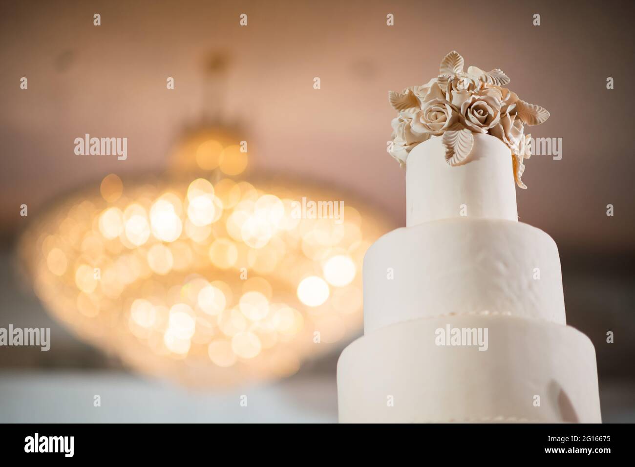 Beautiful wedding cake with blur background Stock Photo - Alamy