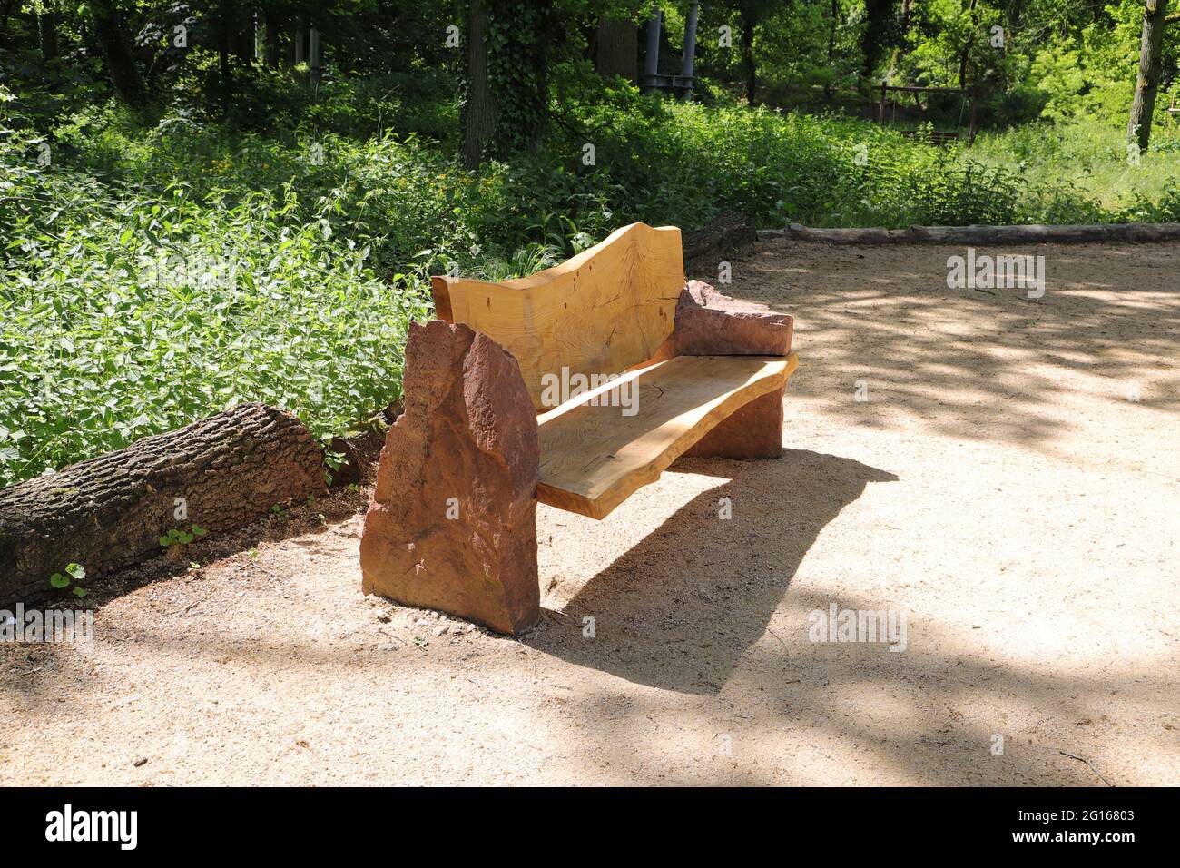 a nice brown garden bench Stock Photo - Alamy