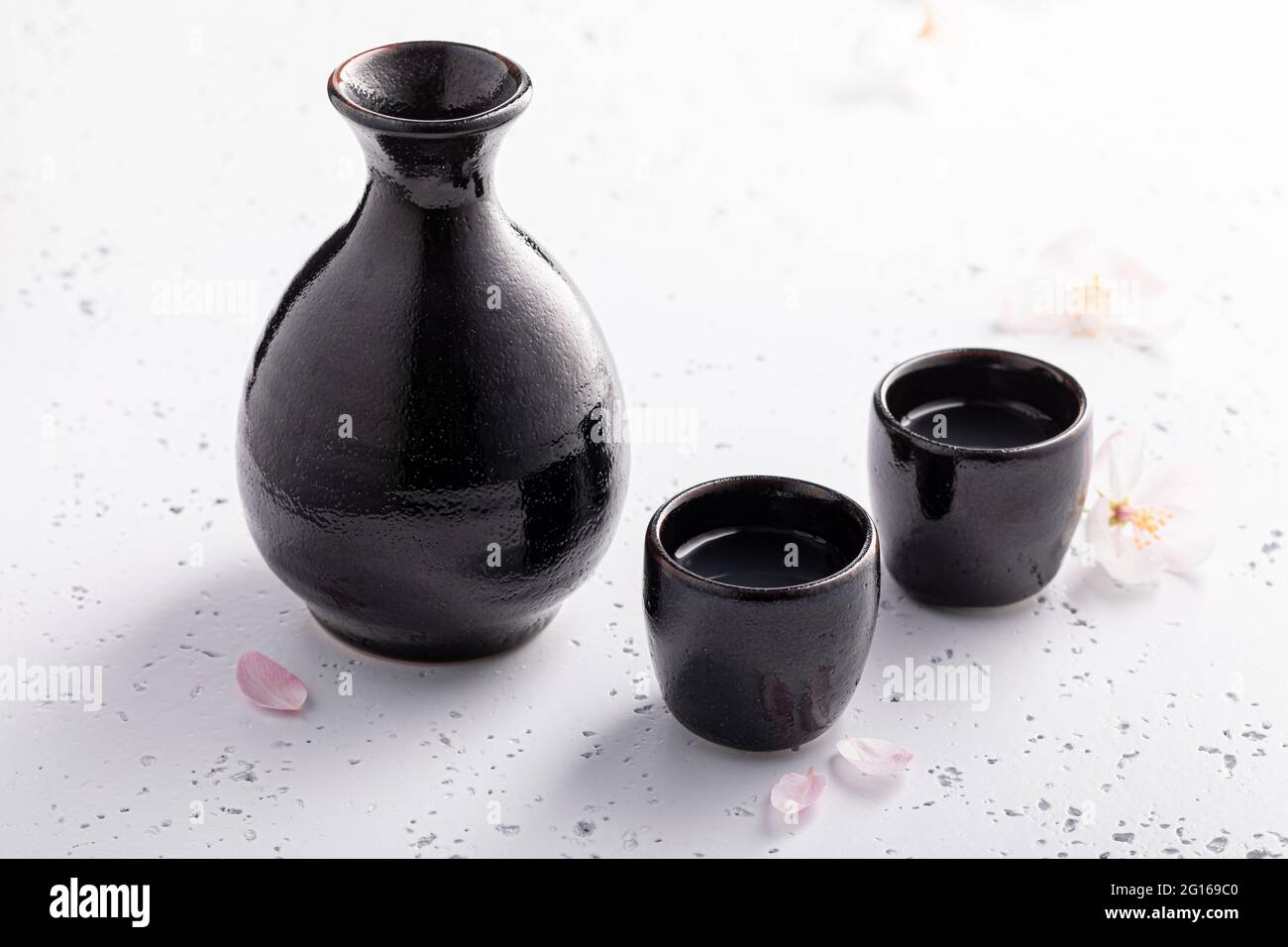 Strong sake with blooming cherry. Japanese habit of drinking alcohol ...